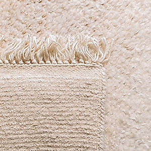 SAFAVIEH Casablanca Shag Collection 8' x 10' Beige CSB521B Handmade Fringe Wool 0.8-inch Thick Area Rug