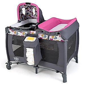 BABY JOY 5 in 1 Pack and Play, Portable Baby Playard w/Bassinet & Diaper Changing Table, Infant Nursery Center Pink Bassinet with Toys & Music & Oxford Bag for Baby Girl Toddlers (Rose, Dot Circle)