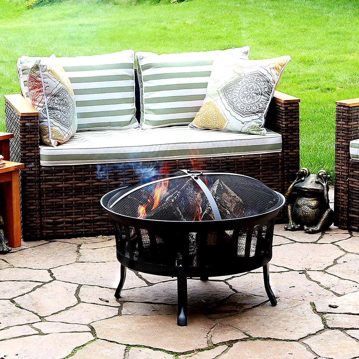 Sunnydaze 25-Inch Steel Wood-Burning Fire Pit with Mesh Stripe Cutouts - Includes Poker and Spark Screen