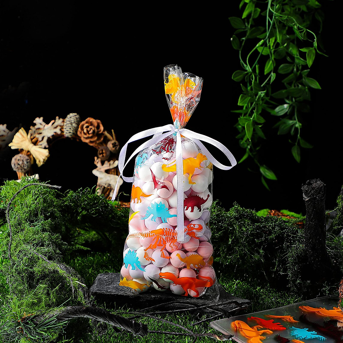 Outus 100 Pieces Dinosaur Cellophane Bags Clear Dinosaur Skeleton Bags Party Favors Bags with A Roll of Ribbon for Chocolate Candy Snacks Cookies Dinosaur Themed Party Supplies (Mixed Colors)