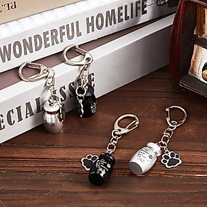 Sasylvia 4 Pcs Pet Urns Keychain Pet Ashes Keychain Dogs Keepsake Cremation Jewelry Stainless Steel Dog Paw Charm Ashes Holder with 4 Storage Bags for Cats Memorial