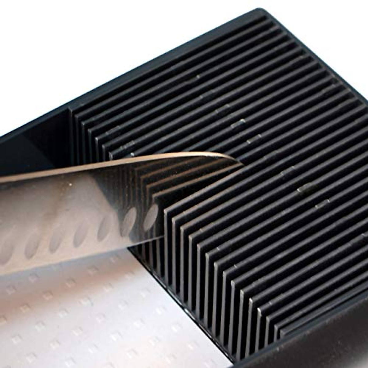 Plastic KNIFEdock - In-Drawer Knife Storage for your kitchen. Replace your knife block with a revolutionary product. Clear your counter top of clutter, and easily identify the desired knife. KNIFEdock