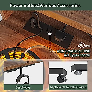 FEZIBO Triple Motor L Shaped Stadning Desk with LED Strip & Power Outrlets，63 inches Height Adjustable Stand up Corner Desk with Ergonomic Monitor Stand, Black Frame/Black Walnut Top