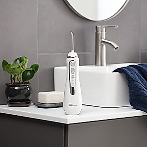 Waterpik Cordless Advanced Water Flosser For Teeth, Gums, Braces, Dental Care With Travel Bag and 4 Tips, ADA Accepted, Rechargeable, Portable, and Waterproof, White WP-580