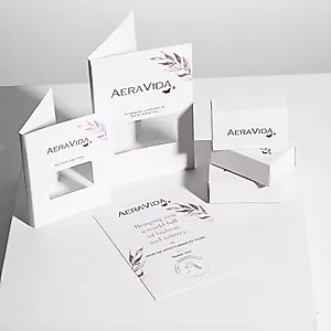 AeraVida Adorable Twin Hearts Dangle Twisted Band .925 Sterling Silver Ring | Charming and Elegant Women's Jewelry Accessory