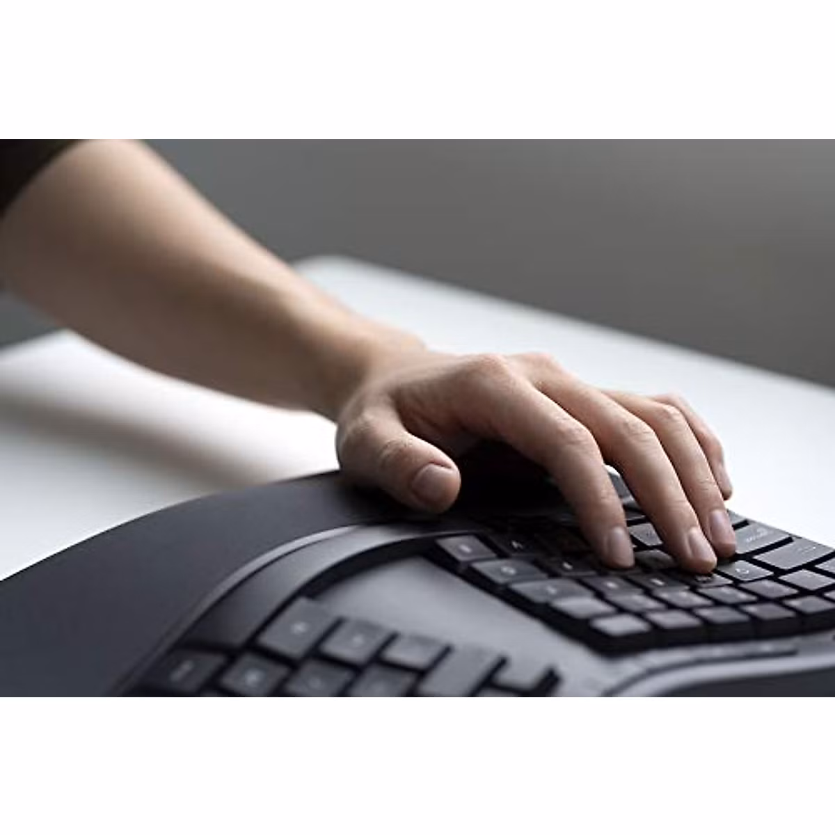 Microsoft Ergonomic Keyboard - Black. Wired, Comfortable, Ergonomic Keyboard with Cushioned Wrist and Palm Support. Split Keyboard. Dedicated Office Key.