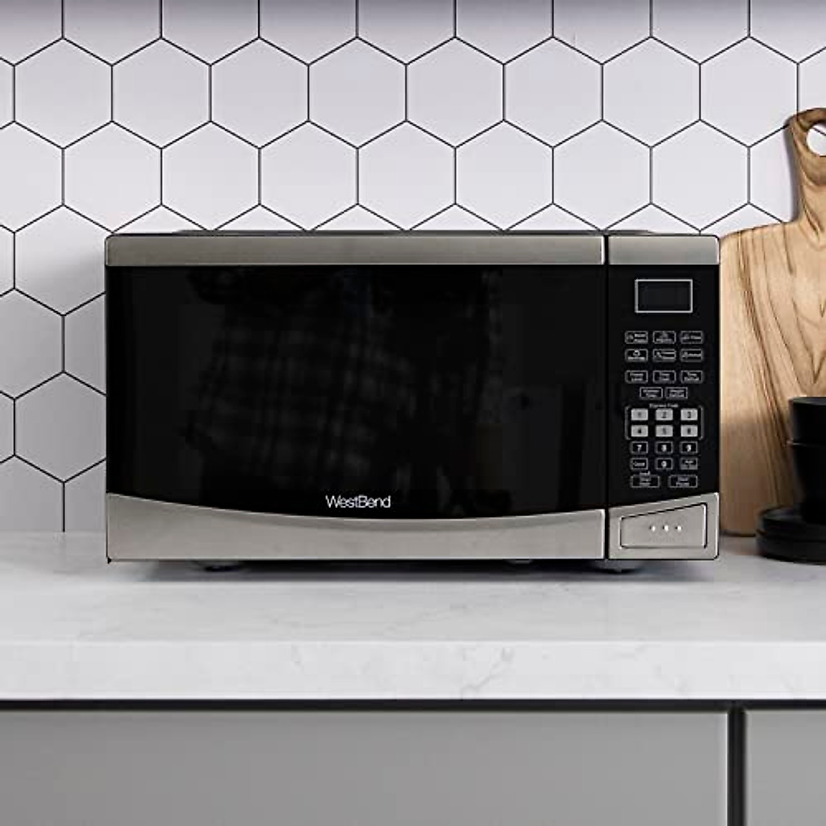 West Bend WBMW92S Microwave Oven 900-Watts Compact with 6 Pre Cooking Settings, Speed Defrost, Electronic Control Panel and Glass Turntable, Metallic