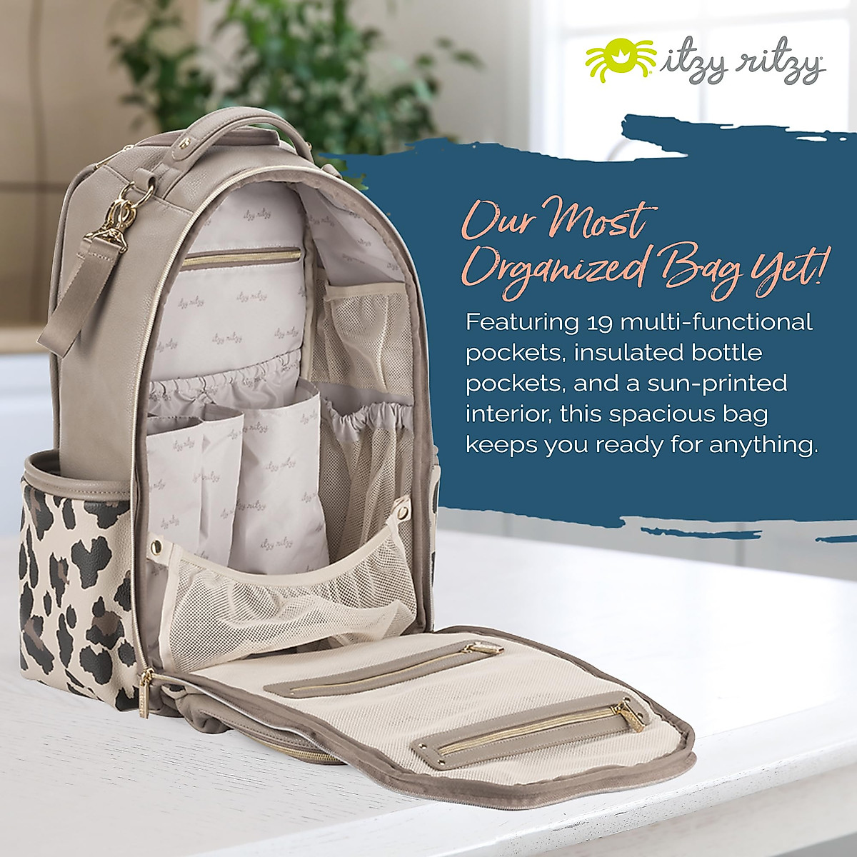Itzy Ritzy Diaper Bag Backpack – Large Capacity Boss Plus Baby Backpack Diaper Bag Featuring 19 Pockets, Changing Pad, Stroller Clips, and Comfortable Backpack Straps, Leopard