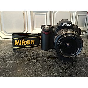 Nikon D90 12.3MP DX-Format CMOS Digital SLR Camera with 18-55 mm Nikon Zoom Lense + 55-200 mm Nikon Zoom Lense