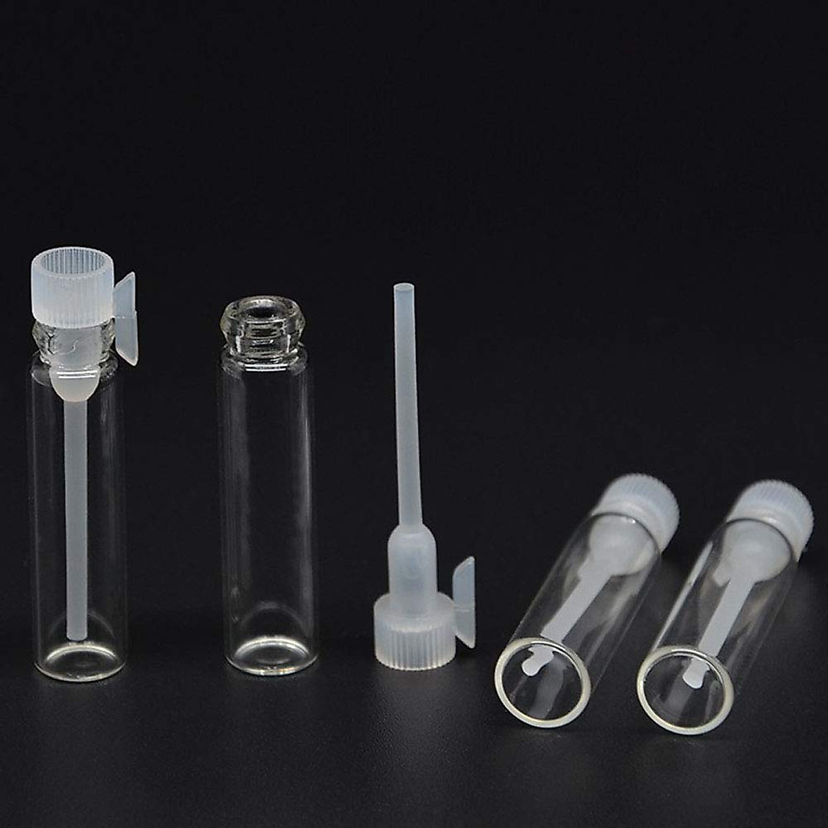 Teensery 100 Pcs Empty Perfume Sample Bottles Mini Glass Refillable Sample Vial Containers with Clear Cap for Aromatherapy, Essential Oil, Fragrance and Liquid (1ml)