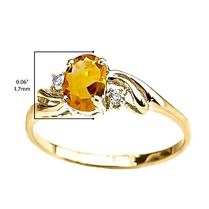 10K Yellow Gold, Orange-Yellow Oval Cut Cubic Zirconia & White Topaz Three Stone Swirl Simulated Citrine November Engagement Ring - Size 6-1/2