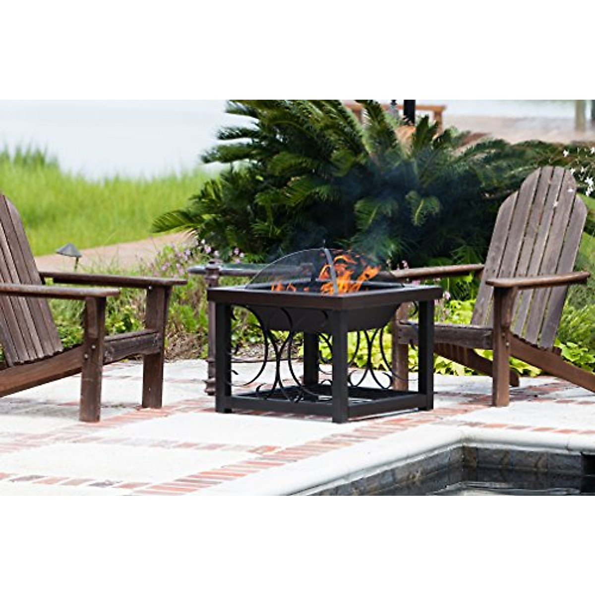 Fire Sense 61331 Fire Pit Cocktail Square Table Wood Burning Steel Mesh Spark Screen Wood Grate Screen Lift Steel Firepit with Log Storage Rack - Hammer Tone Bronze Finish