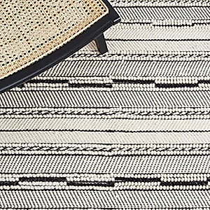 SAFAVIEH Natura Collection Accent Rug - 4' x 6', Black & Ivory, Handmade Flat Weave Boho Farmhouse Wool, Ideal for High Traffic Areas in Entryway, Living Room, Bedroom (NAT281Z)