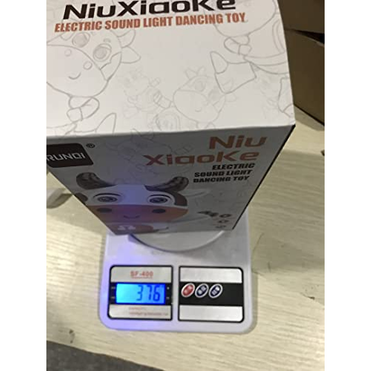 Qiopertar Electric Dazzling Dance Mini Robot Light Music Dance Rotating Robot Children's Toy Baby Cow Musical Toys Christmas Birthday Gift for Kids Boys Girls