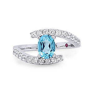 GEMVIO Collection Bypass Design, 5X7MM Oval Blue Topaz Gemstone And Cubic Zirconia Promise Ring In 14k White Gold Over Sterling Silver Sterling Silver Engagement Wedding Ring For Womens Size-6