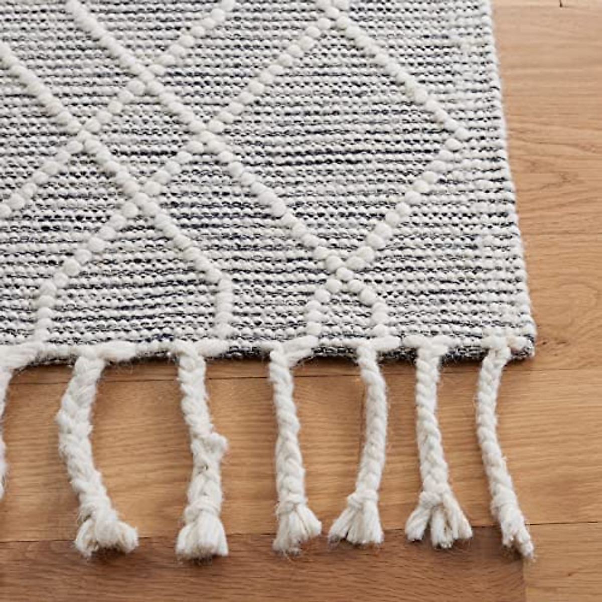 Safavieh Natura Collection Accent Rug - 4' x 6', Ivory & Black, Handmade Boho Geometric Braided Tassel Wool, Ideal for High Traffic Areas in Entryway, Living Room, Bedroom (NAT323A)