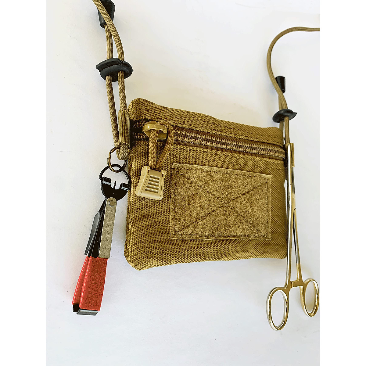 River Canyon - Pouch Lanyard with Nippers - This Fly Fishing Lanyard has a Water-Resistant Zipper Pouch, Nippers are Also Included. There is a Loop to Hang Your hemostat. Two More Rings to Hang Tools