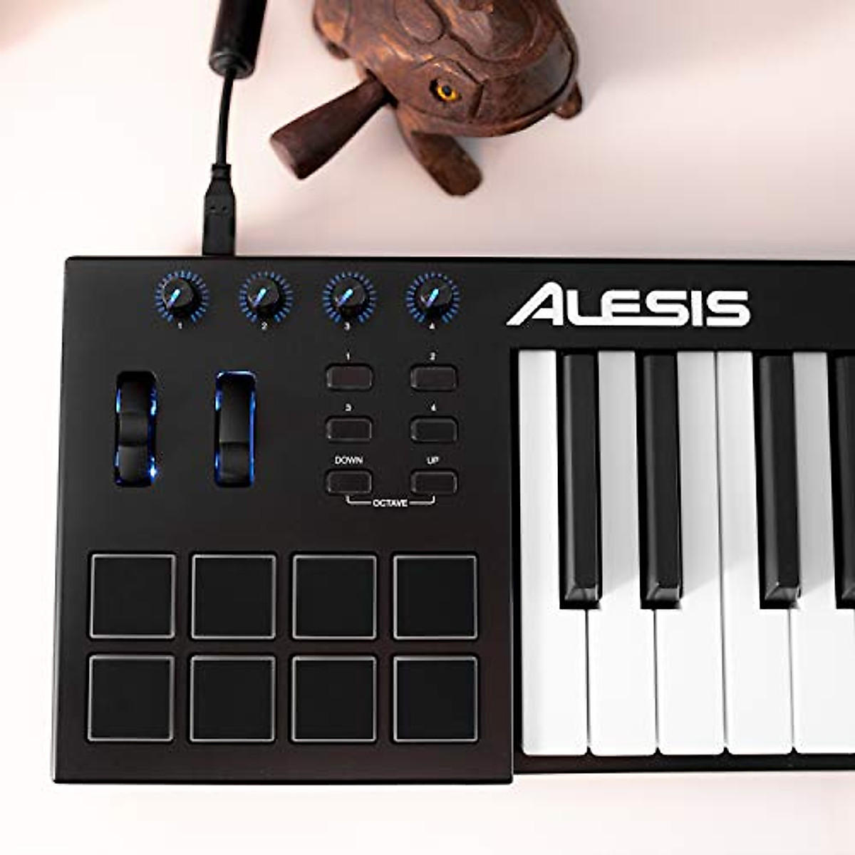 Alesis V49 - 49 Key USB MIDI Keyboard Controller with 8 Backlit Pads, 4 Assignable Knobs and Buttons, Plus a Professional Software Suite Included