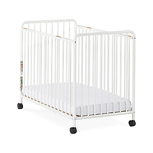 Child Craft Siesta Metal Compact Non-Folding Portable Crib with 2” Crib Mattress and Locking Wheels, Durable Metal Construction, Easy to Clean (White)