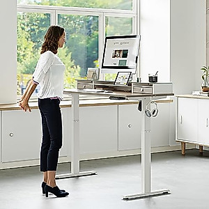 FEZIBO Electric Standing Desk with Double Drawers, 48 x 24 Inch Glass Top Monitor Stand Adjustable Sit Stand Desk with Storage Shelf, White Frame/LightWalnut Top