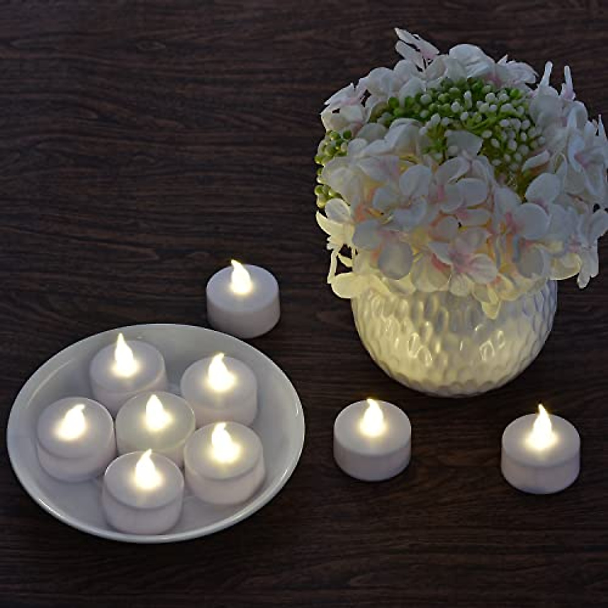 Artmarry Battery Operated Tea Lights Flameless Flickering LED Tealights 24 Pack Warm White Lamp Votive Fake Candle Long Lasting 200+ Hours for Home Holiday Wedding Celebration (Warm White 24 Pack)