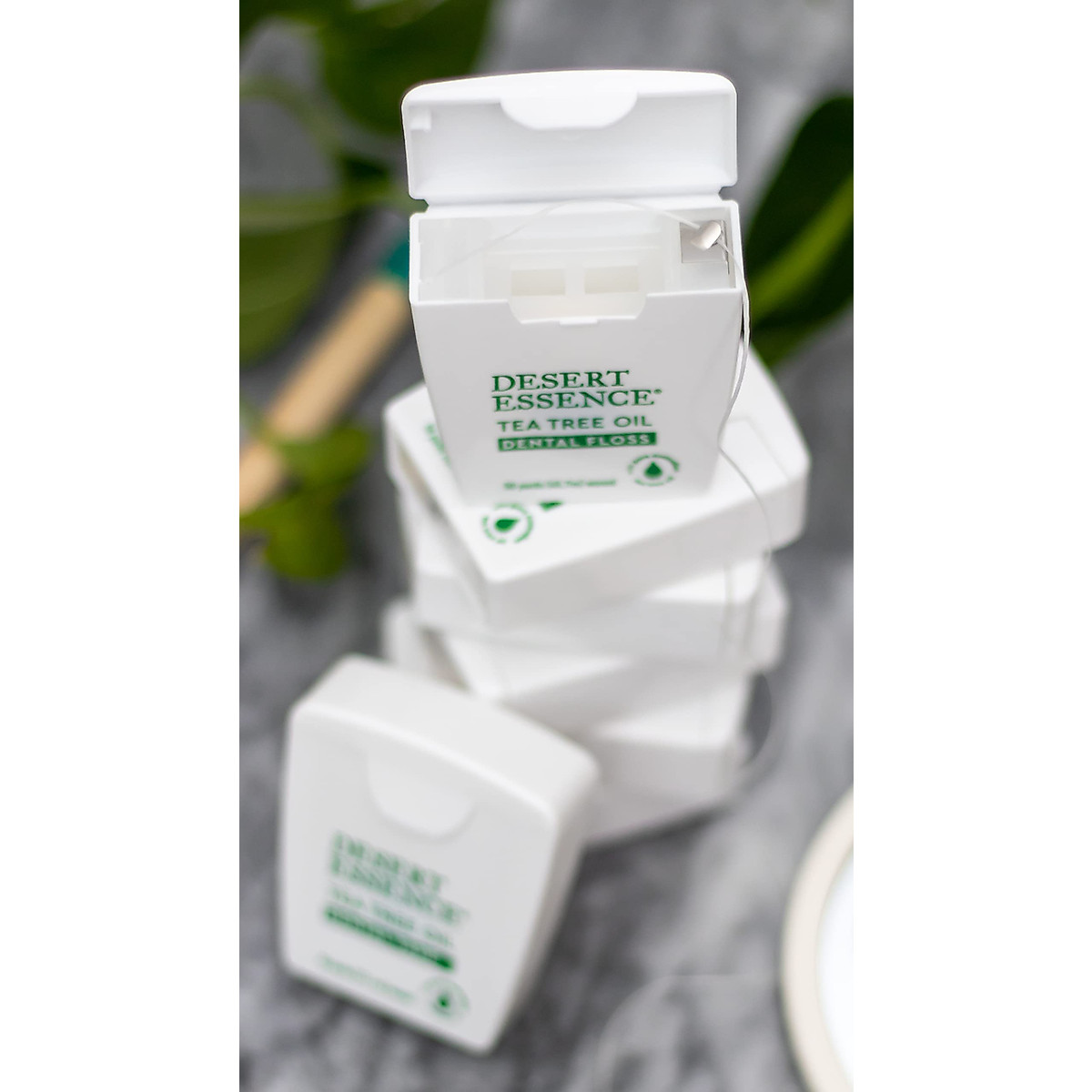 Desert Essence Tea Tree Oil Dental Floss - 50 yards - Naturally Waxed w/Beeswax - Thick Flossing No Shred Tape - On the Go - Removes Food Debris Buildup - Cruelty-free Antiseptic