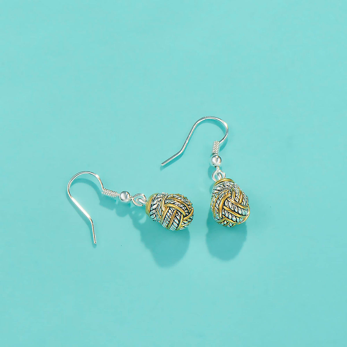 UNY Jewel Jewelry Make a Statement With Our Two Tone Twisted Cable Wire Dangle Ball Fish Hook Earrings Featuring Detailing Perfect For Any Occasion