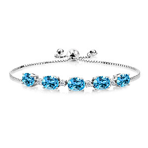 Gem Stone King 925 Sterling Silver Swiss Blue Topaz and White Topaz Tennis Bracelet For Women (7.84 Cttw, Center Stone: 8X6MM, Small Stones: 2.5MM, Gemstone Birthstone, Fully Adjustable Up to 9 Inch)