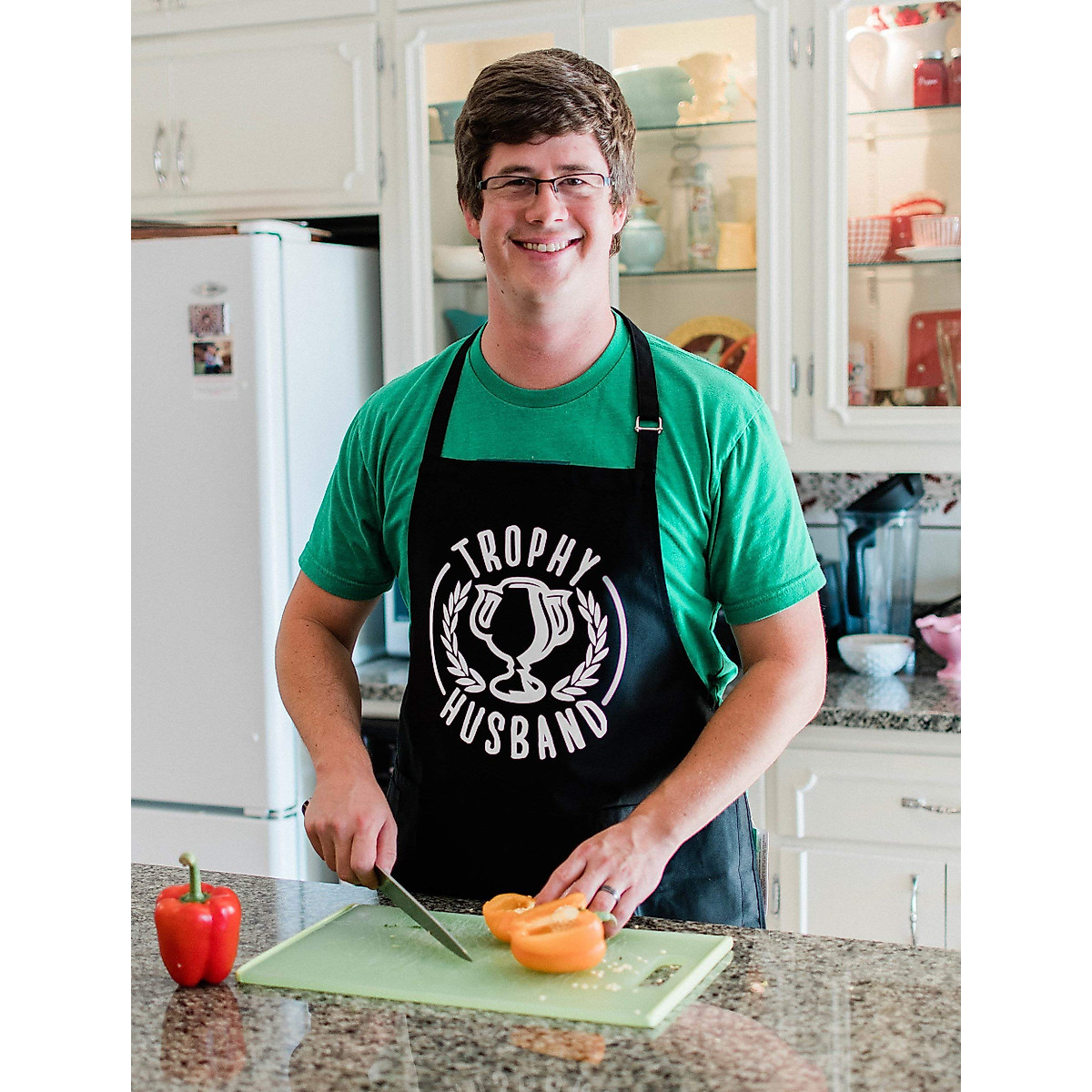 ApronMen Trophy Husband Funny Aprons For Men - Adjustable Straps - One Size Fits All Grilling Apron With Pockets - Professionally Printed Gift For Dad Or House Husband - Cotton Kitchen BBQ Chef Apron