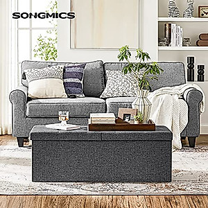 SONGMICS 31.7-Gal Storage Ottoman Bench, Folding Storage Chest, Footstool with Flip-Up Lid, Padded Seat, 43.3 x 15 x 15 Inches, Up to 660 lb, Dark Gray ULSF76GYZ