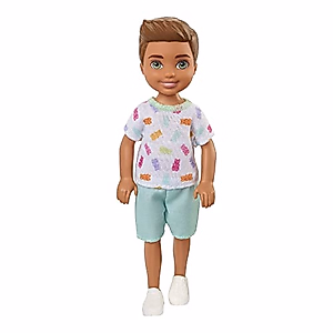 Barbie Chelsea Doll, Small Boy Doll with Brown Hair & Blue Eyes Wearing Gummy Bear T-Shirt, Shorts & Shoes
