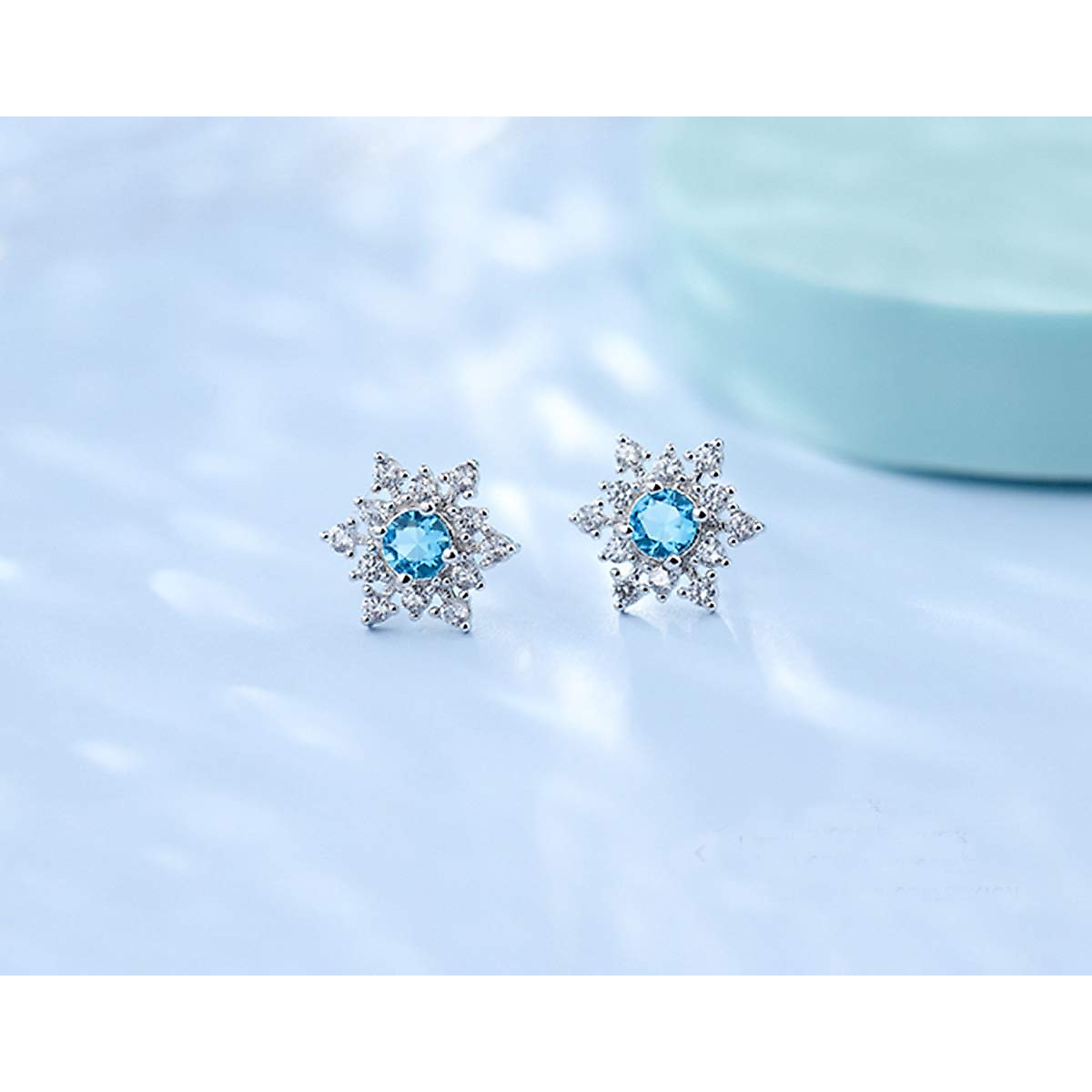 SLUYNZ 925 Sterling Silver Sparkling Blue Crystal Snowflake Studs Earrings for Women Pretty Snowflake Earrings Studs (A-Silver)