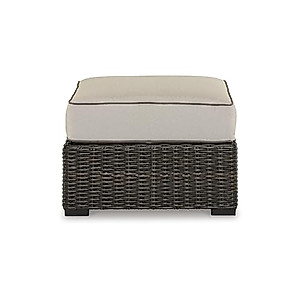 Signature Design by Ashley Coastline Bay Outdoor Patio All-Weather Resin Wicker Ottoman with Cushion, Beige & Dark Brown