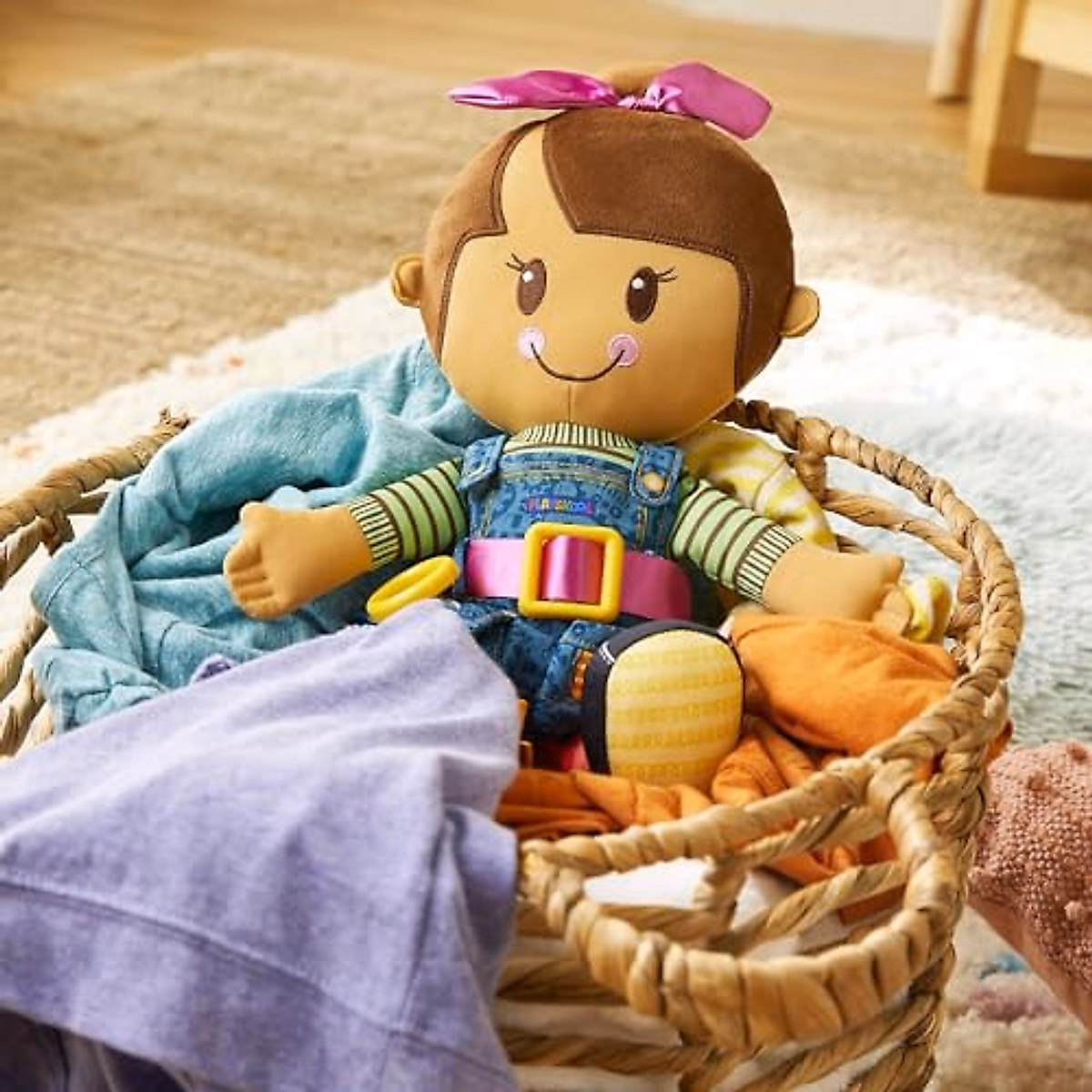 Playskool Dressy Kids Doll, Brown Hair and Bow, Activity Plush Toy with Zipper, Shoelace, Button, For Ages 2+ (Amazon Exclusive)