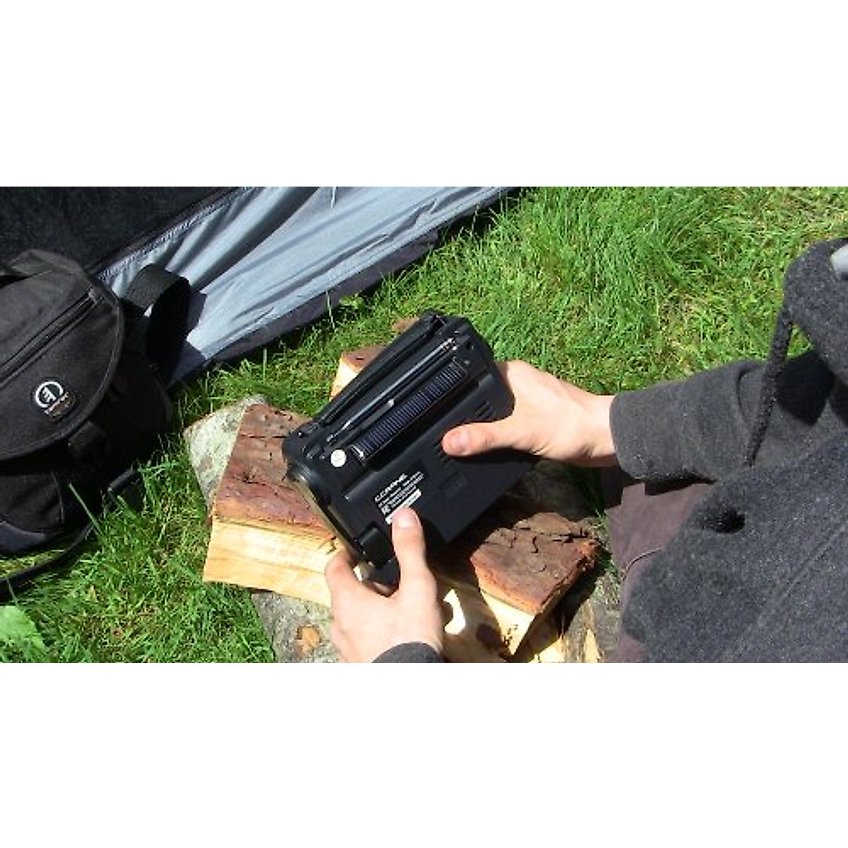 C. Crane CC Solar Observer Wind Up Solar Emergency Crank Radio with AM, FM, NOAA Weather, Built in LED Flashlight, Cellphone Charger and AC Adapter