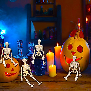 DULEFUN 8pcs Halloween Small Skeleton Glow in The Dark 6 Inch Luminous Mini Plastic Skeletons for Craft Halloween Hanging Décor Poseable Skeleton Toys Party Gifts Favors