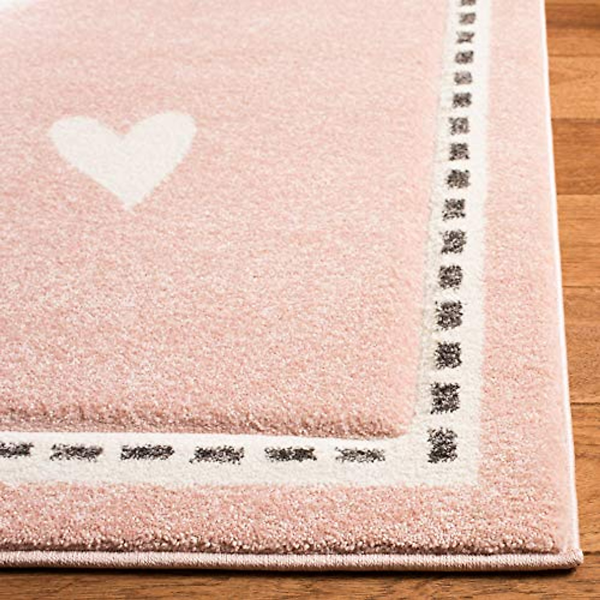 SAFAVIEH Carousel Kids Collection Accent Rug - 3'3" x 5'3", Pink & Ivory, Bunny Design, Non-Shedding & Easy Care, Ideal for High Traffic Areas for Boys & Girls in Playroom, Nursery, Bedroom (CRK166P)