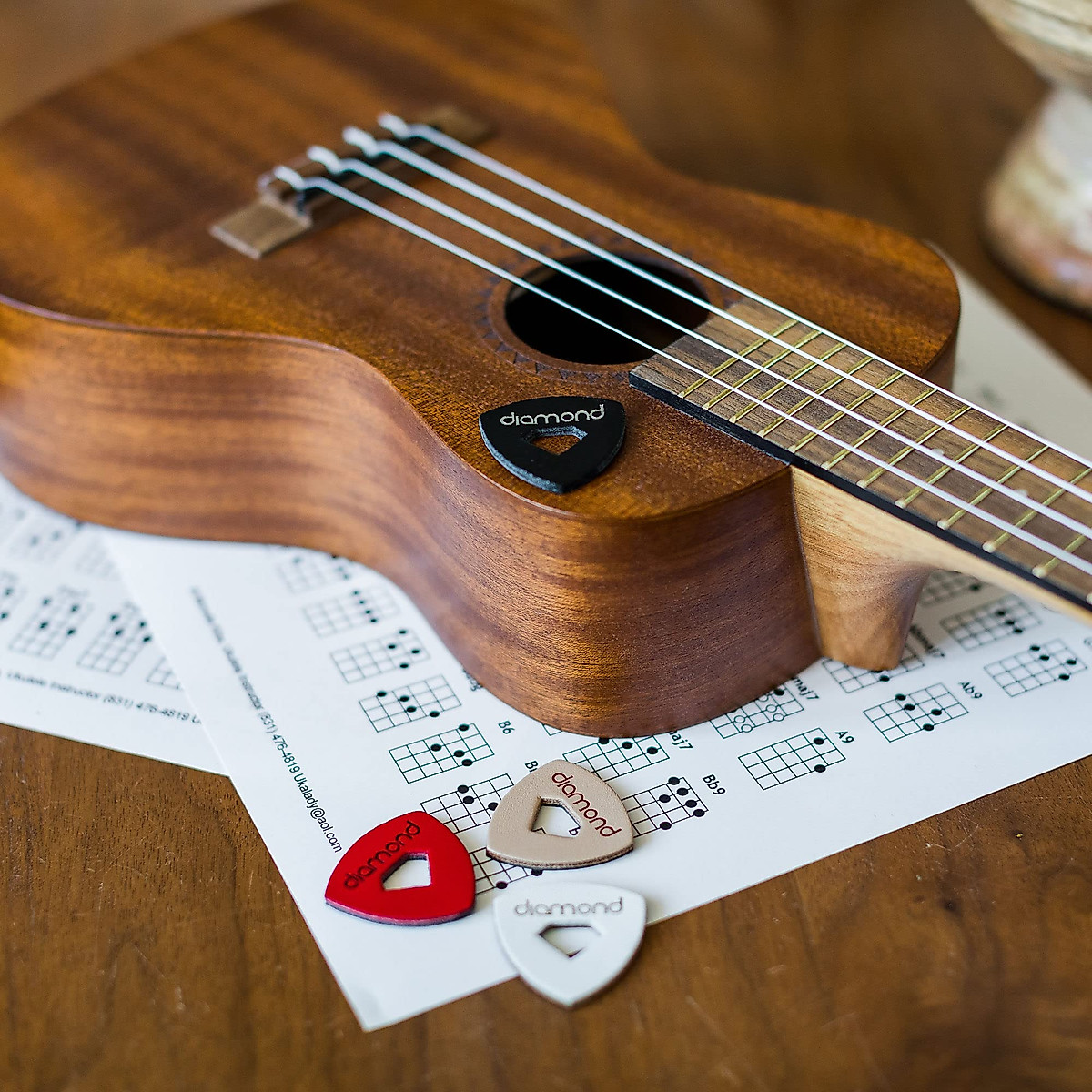 Leather Ukulele Picks with Diamond-Shaped Cutout Hole for Enhanced Grip Never Drop your Pick while Playing also works as a Guitar Pick or Bass Pick 100% Genuine Leather 4-Pack