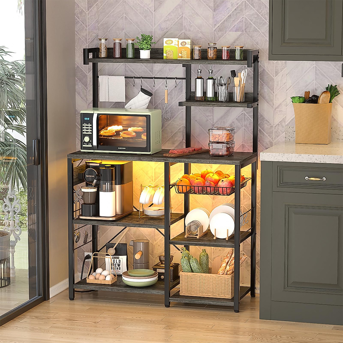 Aheaplus Bakers Rack with Power Outlet and LED Light Strings, Microwave Oven Stand Kitchen Storage Shelf with Wire Basket, Coffee Bar Station Island Table with 10 Hooks for Spices, Pots, Black Oak