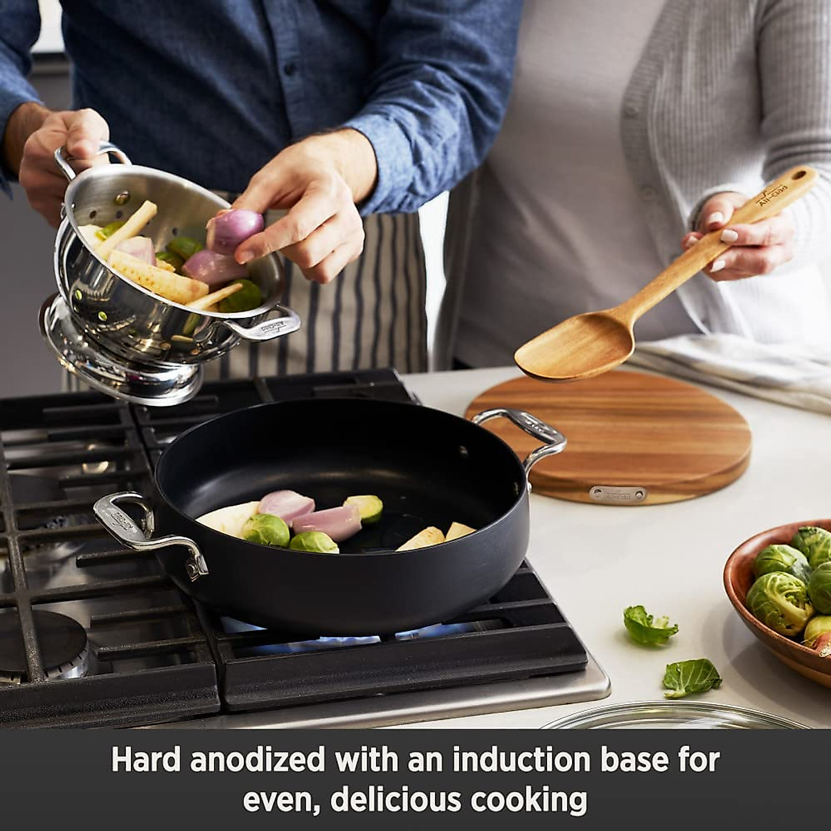 All-Clad HA1 Hard Anodized Nonstick Sauteuse Pan with Acacia Trivet and Spoon 4 Piece, 4 Quart Induction Oven Broiler Safe 500F, Lid Safe 350F Pots and Pans, Cookware Black