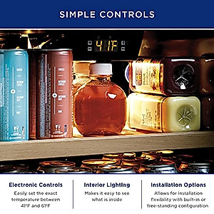 GE Wine Cooler & Beverage Refrigerator | Mini Fridge With Lock & Key Included | Complete With Oak Shelving, Glass Exterior & Warm Interior Lighting | Fits 109 Cans or 31 Wine Bottles | Stainless Steel