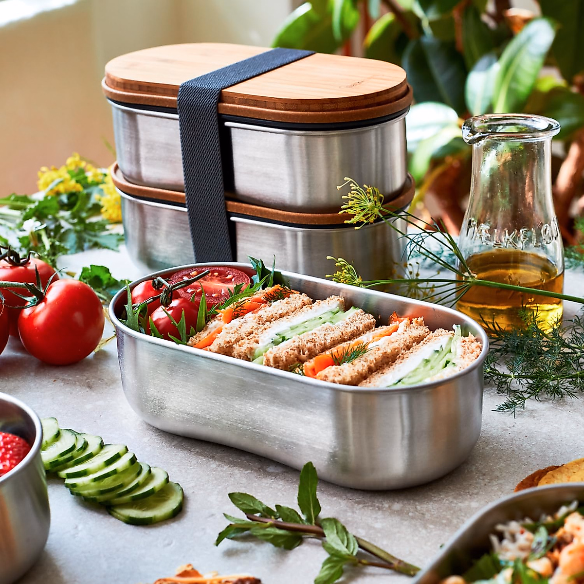 BLACK + BLUM Stainless Steel Bento Box | Plastic Free, Leak-Proof, 2-Compartment Lunch Box with Travel Fork and Bamboo Chopping Board Lid for Packing Healthy and Delicious Food | 34 oz / 1000 ml