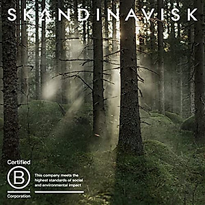 Skandinavisk Skog 'Forest' Scented Candle. Fragrance Notes: Pine Needles and Fir Cones, Birch Sap and Lily of The Valley. 3.17 oz.