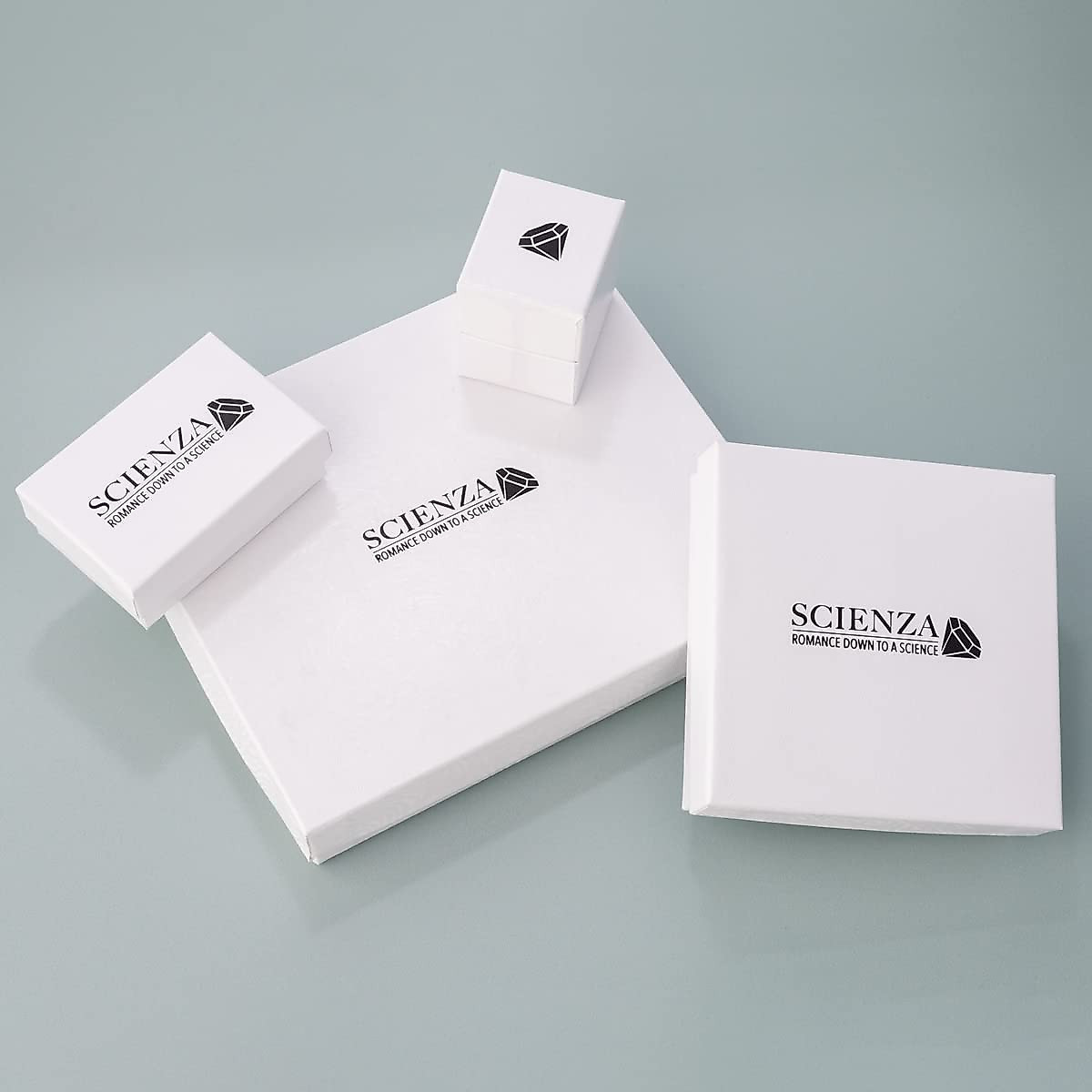 Scienza Resurgence Art Deco Ring for Women – Rhodium Plated Sterling Silver Ring w/Blue Baguette Stones – Blue Spinel & White Cubic Zirconia Ring – Structured Crisscross Geometric Ring