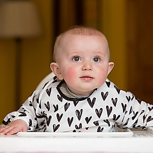 Bumkins Sleeved Bib for Girl or Boy, Baby and Toddler for 6-24 Months, Essential Must Have for Eating, Feeding, Baby Led Weaning Supplies, Long Sleeve Mess Saving Food Catcher, Hearts Black and White