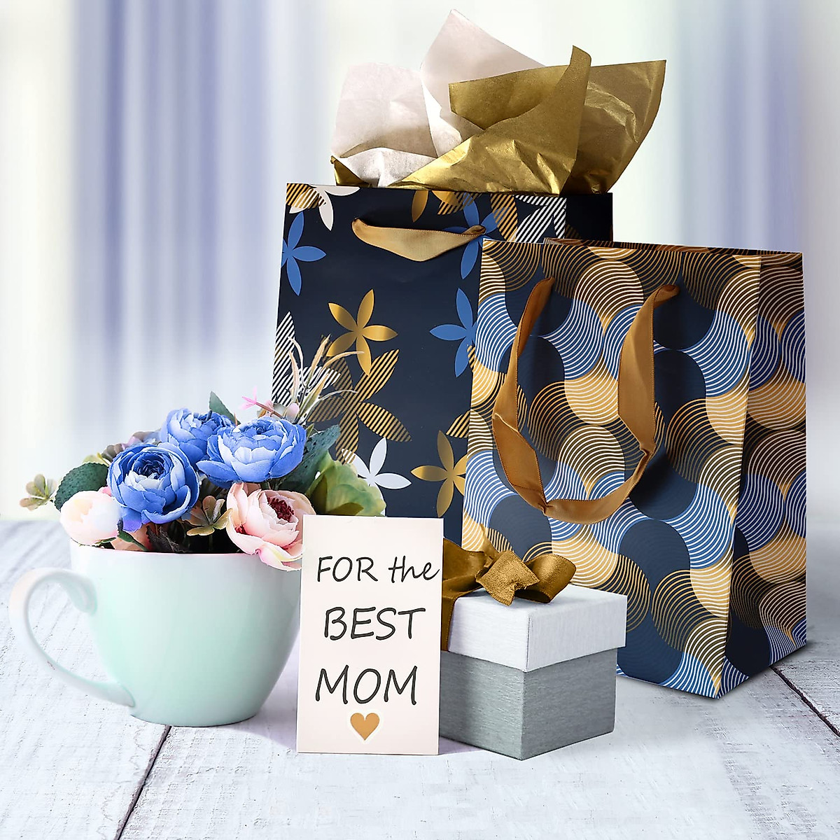 Homeadow Bags - 4 Pcs Assorted Gift Bags, Medium Size (9"x7") - Assorted with 4 Different Designs, Laminated Cardboard, includes 8 tissue papers - Festive Gold Blue Shapes