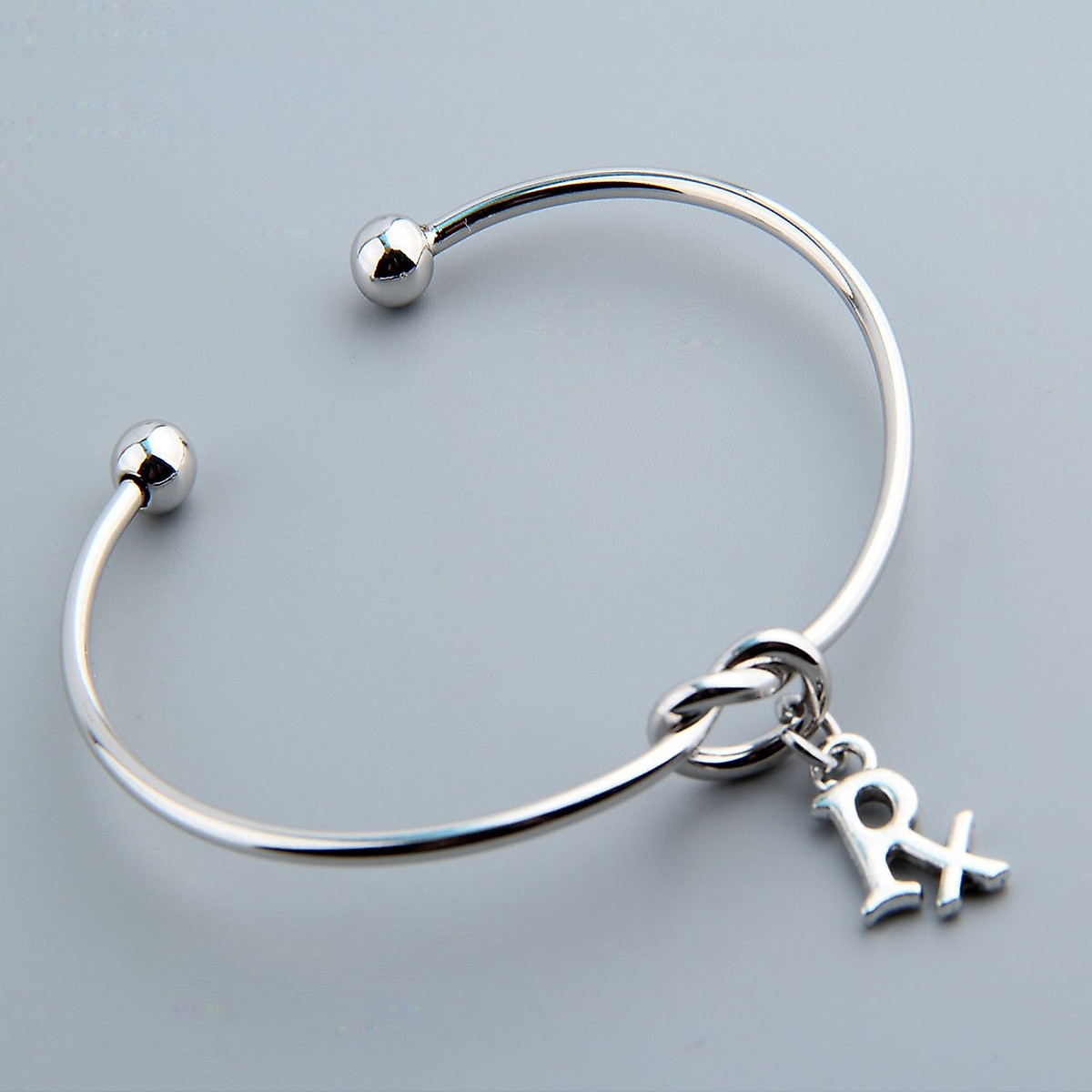 FEELMEM Rx Pharmacist Pharmacy Bracelet Love Knot Bangle with RX Symbol Charm Bracelet Graduation Gift(RX charm-Silver)