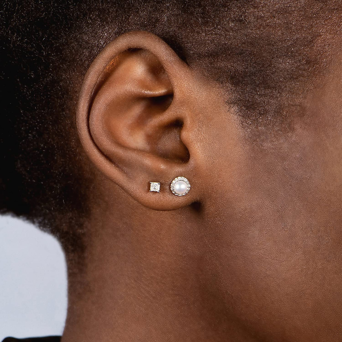 Jewelili 10k Yellow Gold Stud Earrings with 4mm Round Pearl and Natural White Round Diamonds, 1/10 cttw