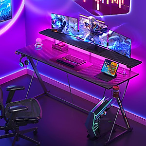 SEVEN WARRIOR Gaming Desk with LED Lights & Power Outlets, 55" Computer Desk with Monitor Shelf, Home Office Desk with Cup Holder and Headphone Hook, Ergonomic, Carbon Fiber Surface Black