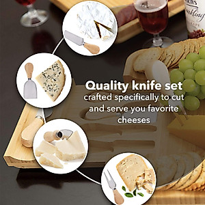 Roots To Table Bamboo Cheese and Charcuterie Board Set. This Cheese Board Set is a Perfect Cheese Platter and Charcuterie Board Gift Set Idea. Slide-Out Drawer Contains Stainless Steel Knife Set.